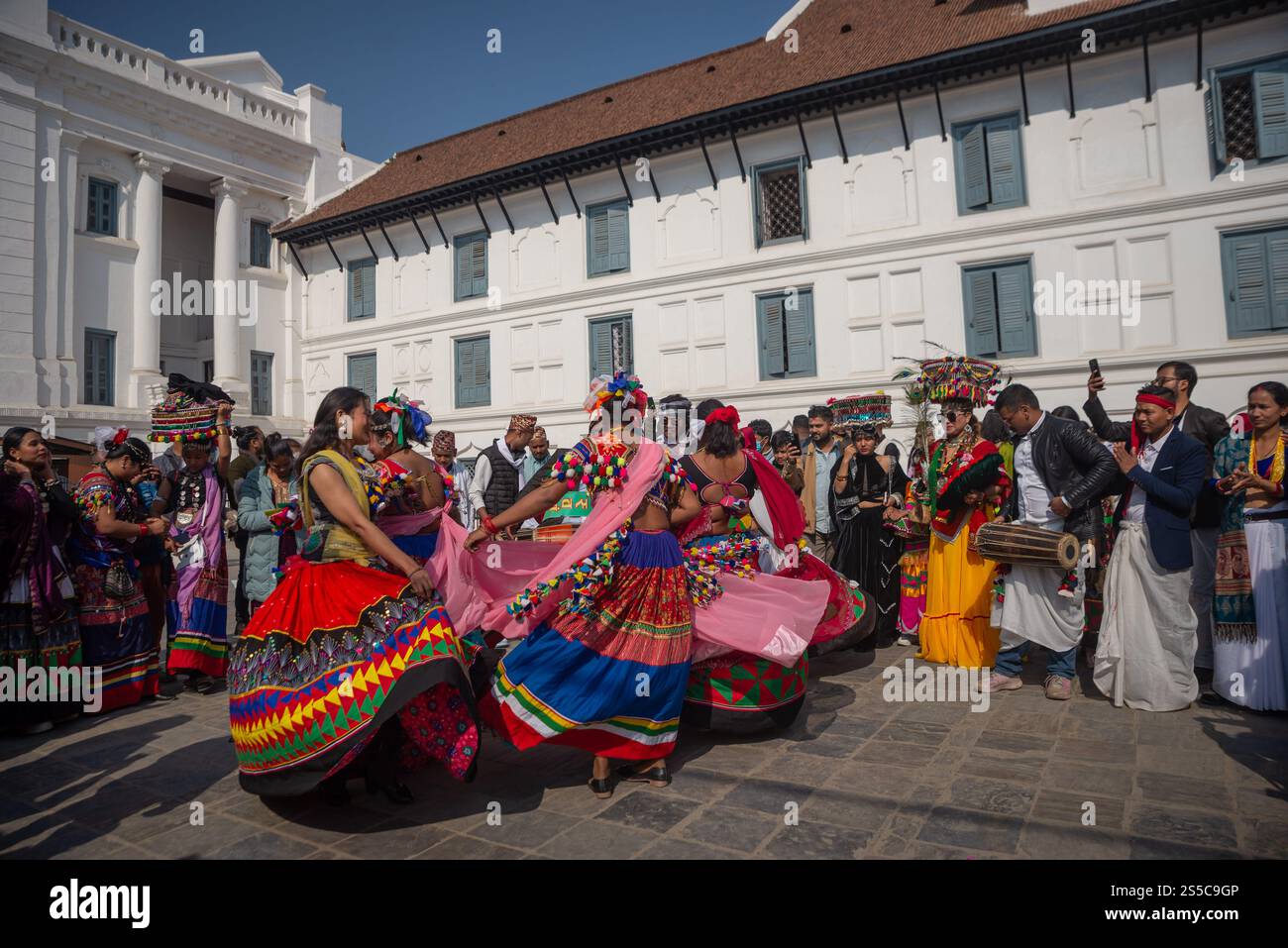 Kathmandu, Nepal. 14th Jan, 2025. Members from tharu community dressed ...