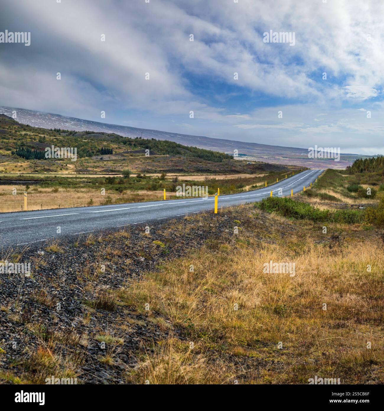 Asphalt road and mountain view during auto trip in Iceland. Spectacular ...