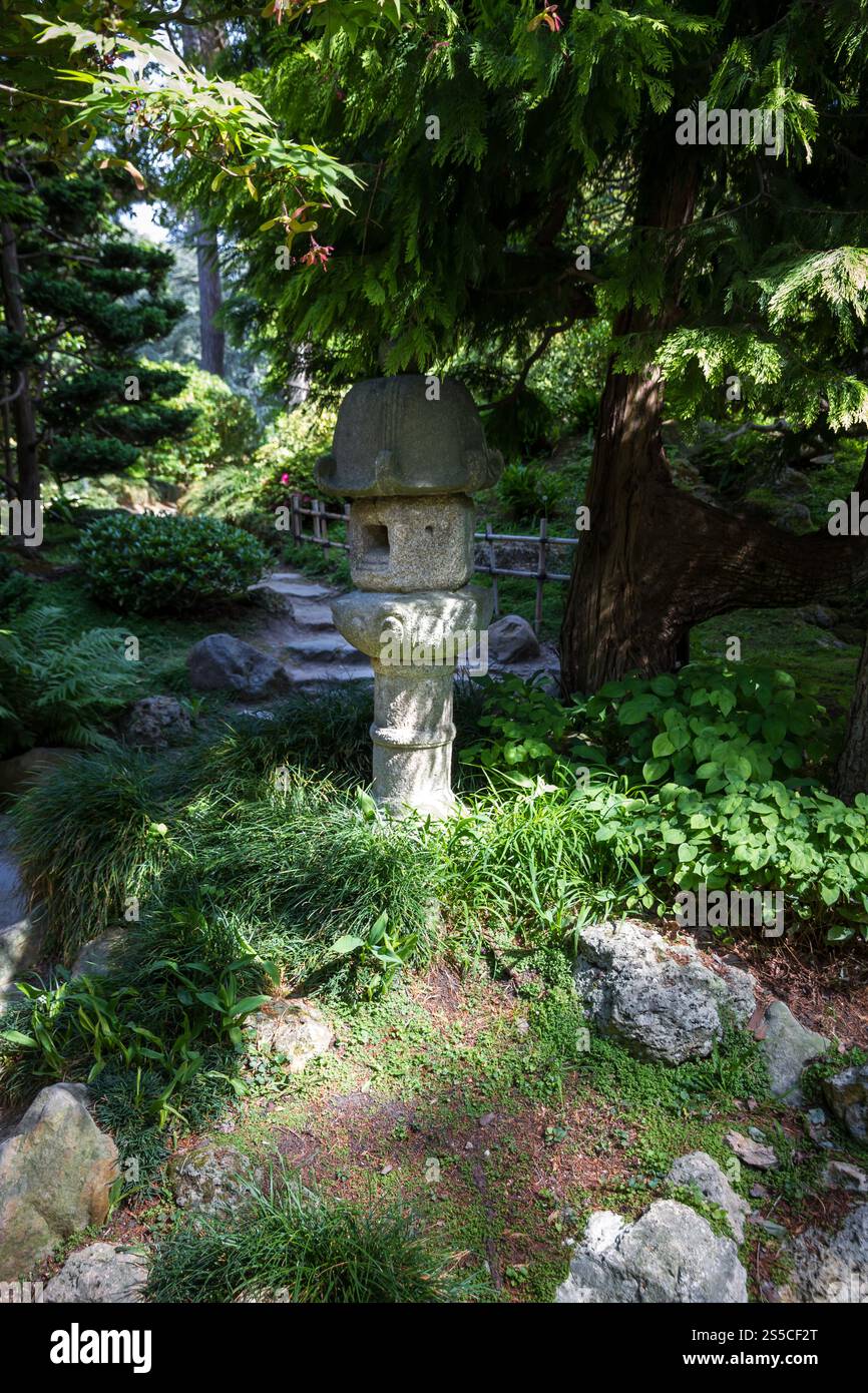 Traditional lamp in a japanese garden. Zen background. Stone lamp in a ...