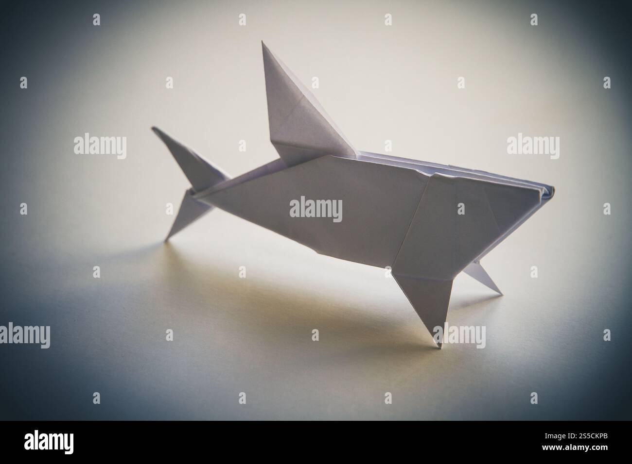 Paper shark origami isolated on a blank background. Paper shark origami ...