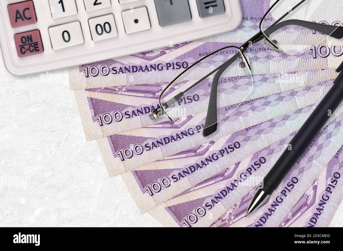 100 Philippine piso bills fan and calculator with glasses and pen ...