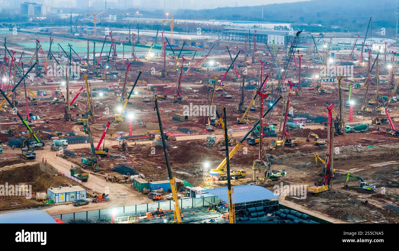 Pile drivers are driving engineering cast-in-place piles on the construction site of the hub ...