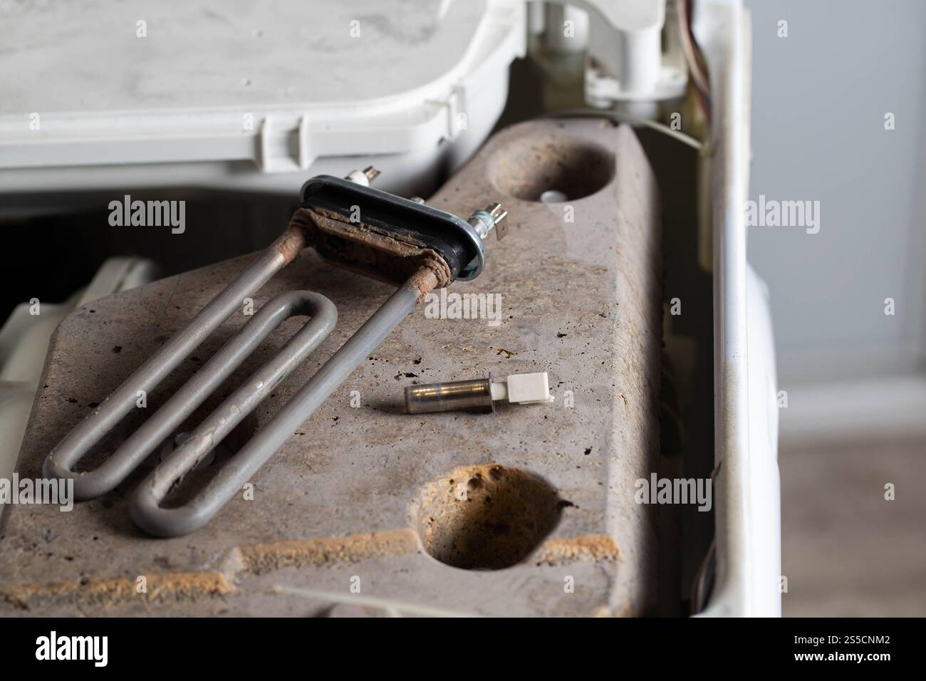 The electric heating element and temperature sensor, thermostat are on ...