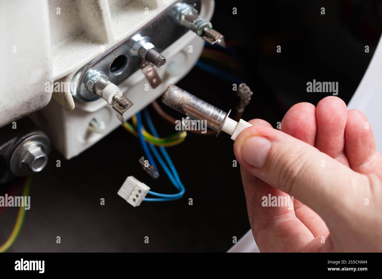 Removing the electric thermostat sensor from the washing machine ...