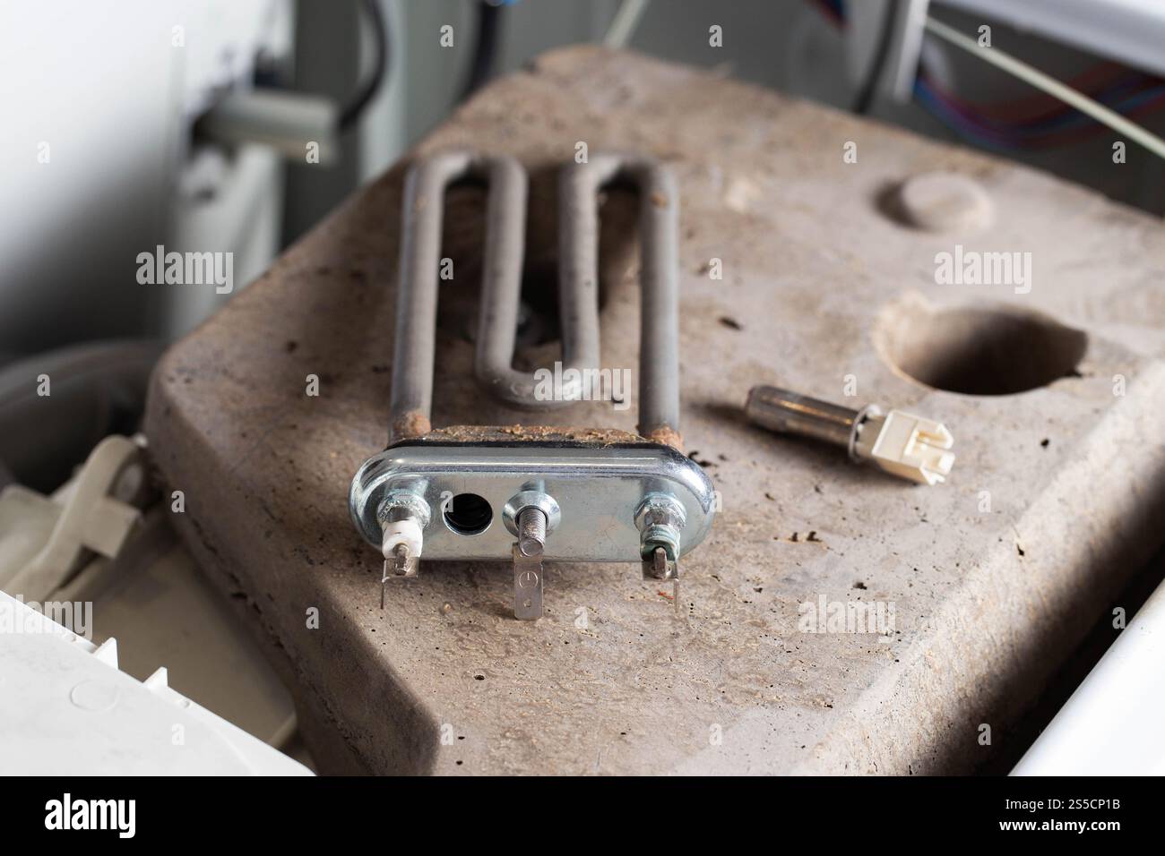 The electric heating element and temperature sensor, thermostat are on ...