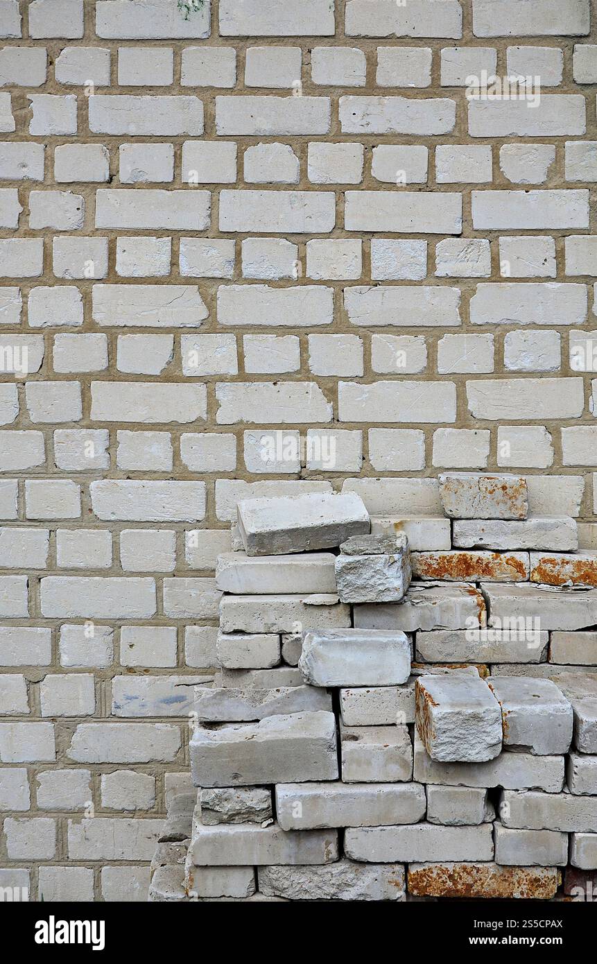 A photo of a set of old bricks that are stacked in a multilayered pile ...