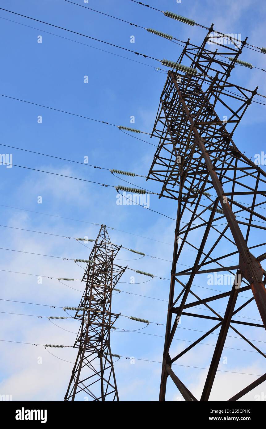 The silhouette of the electricity transmission pylon in daytime outdoors. Electricity Pylon ...