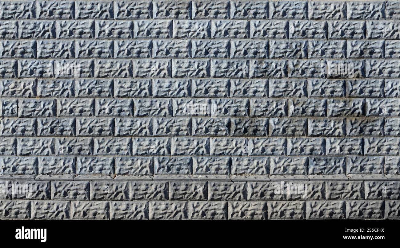 Weathered stained old block wall background. Texture of an old wall of ...