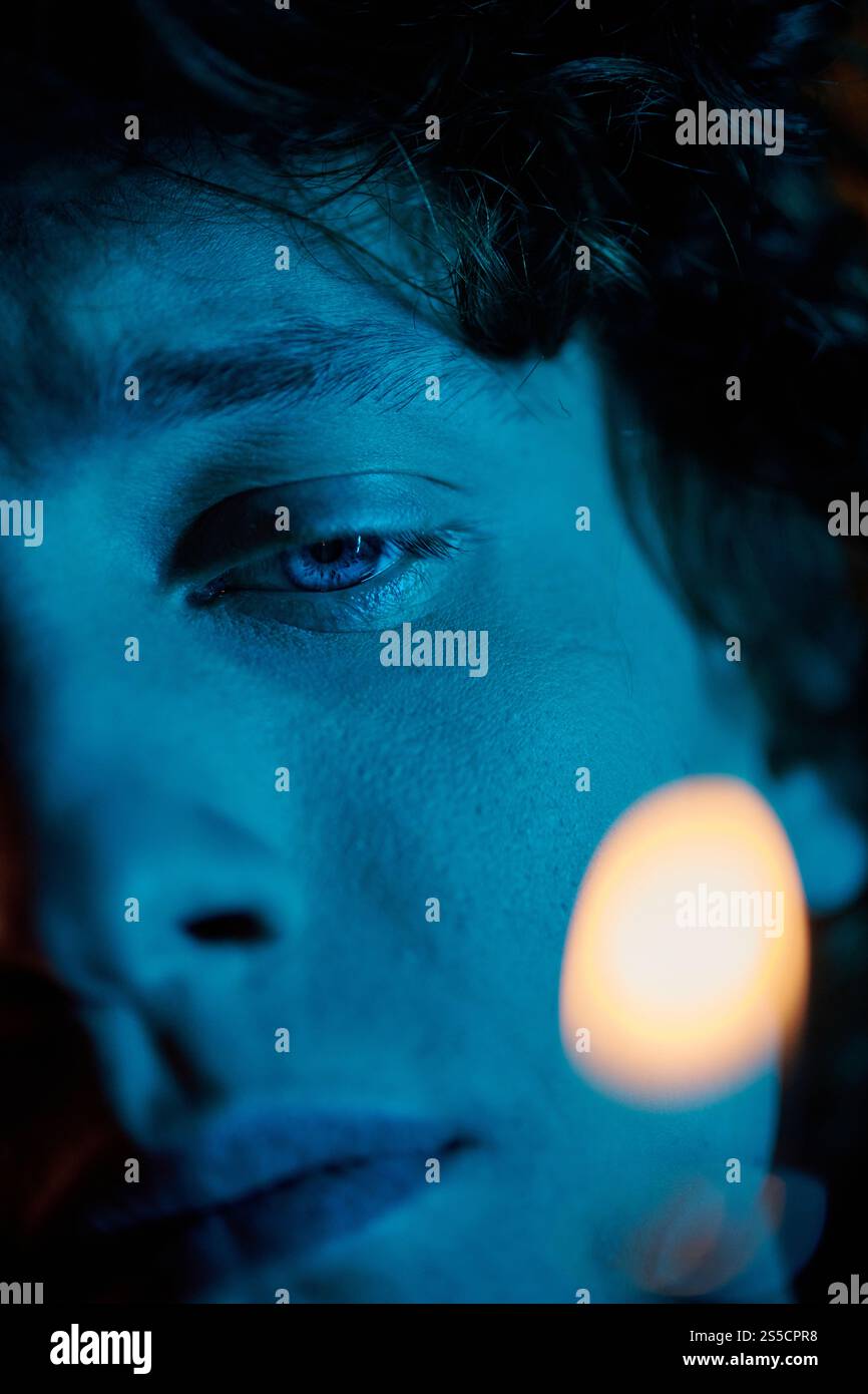 Portrait of man full of sadness and pain looking down Stock Photo - Alamy