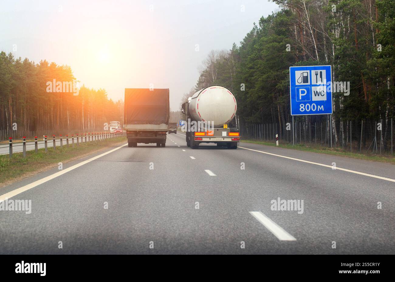 A tanker truck with a semi-trailer transports a dangerous cargo of ...