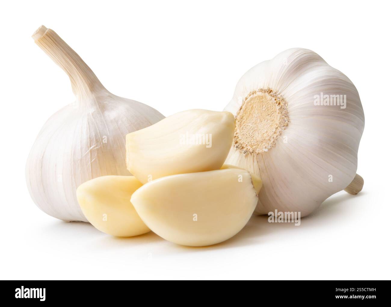 Side view of fresh white garlic bulbs with peeled garlic clove or ...