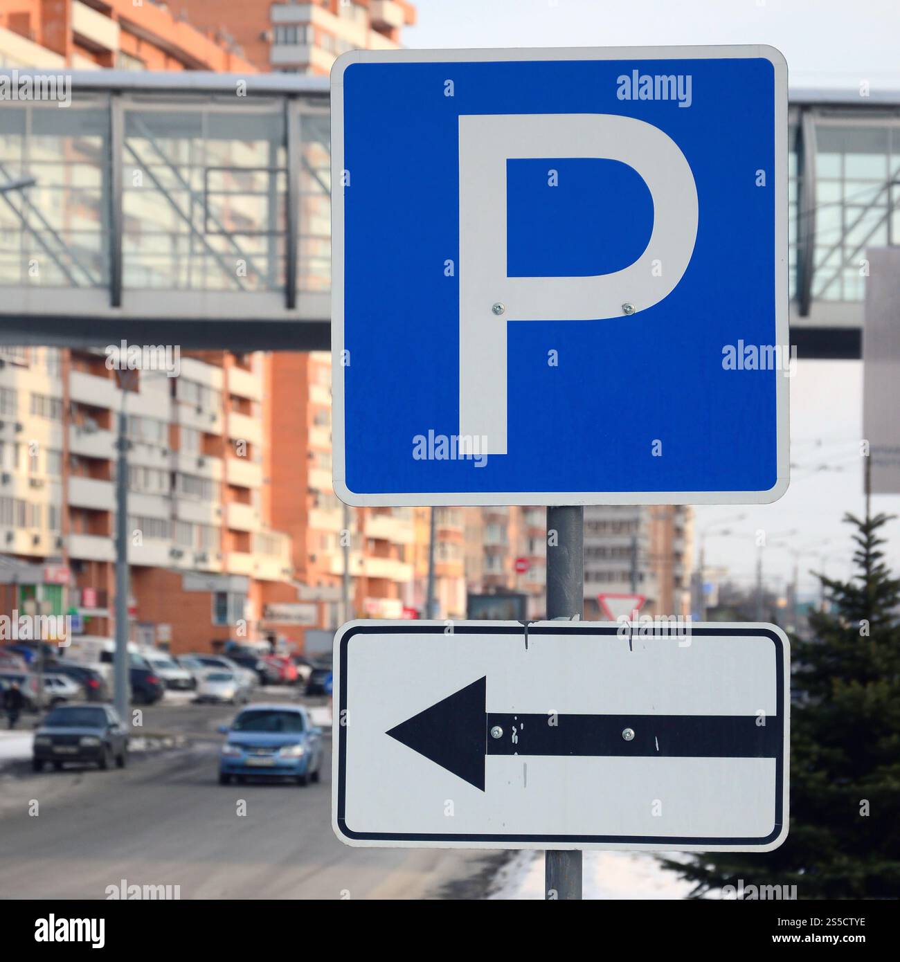 Parking left. Traffic sign with the letter P and the arrows to the left ...