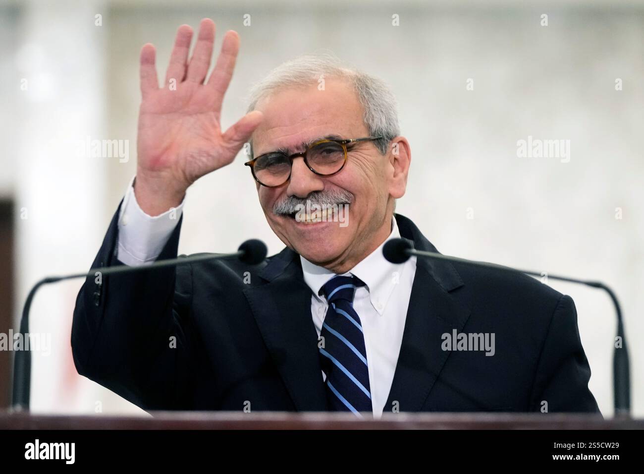 Lebanese Prime Minister-designate Nawaf Salam waves after his meeting ...