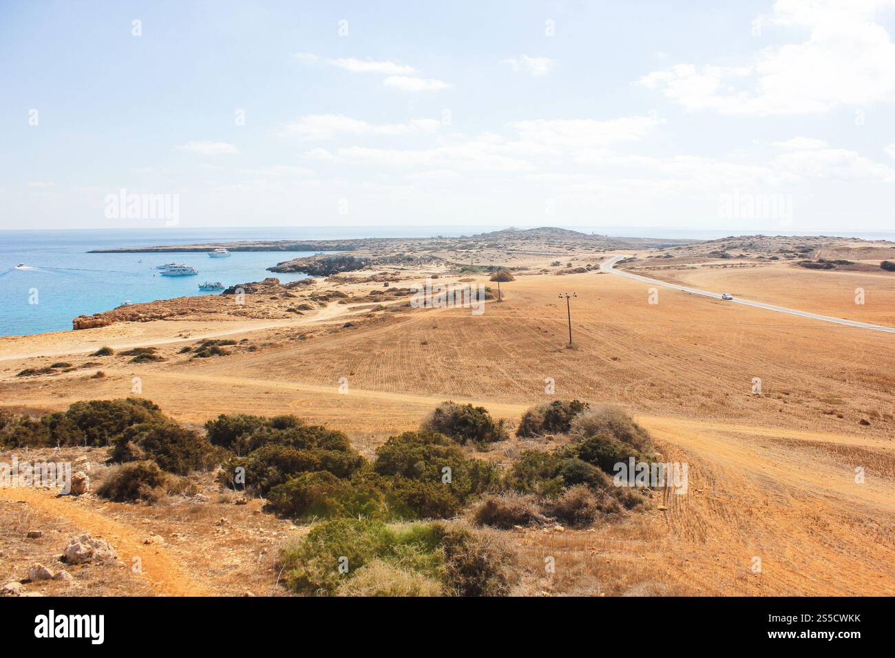 Long distance view of Cape Cavo Greco in summer Stock Photo - Alamy