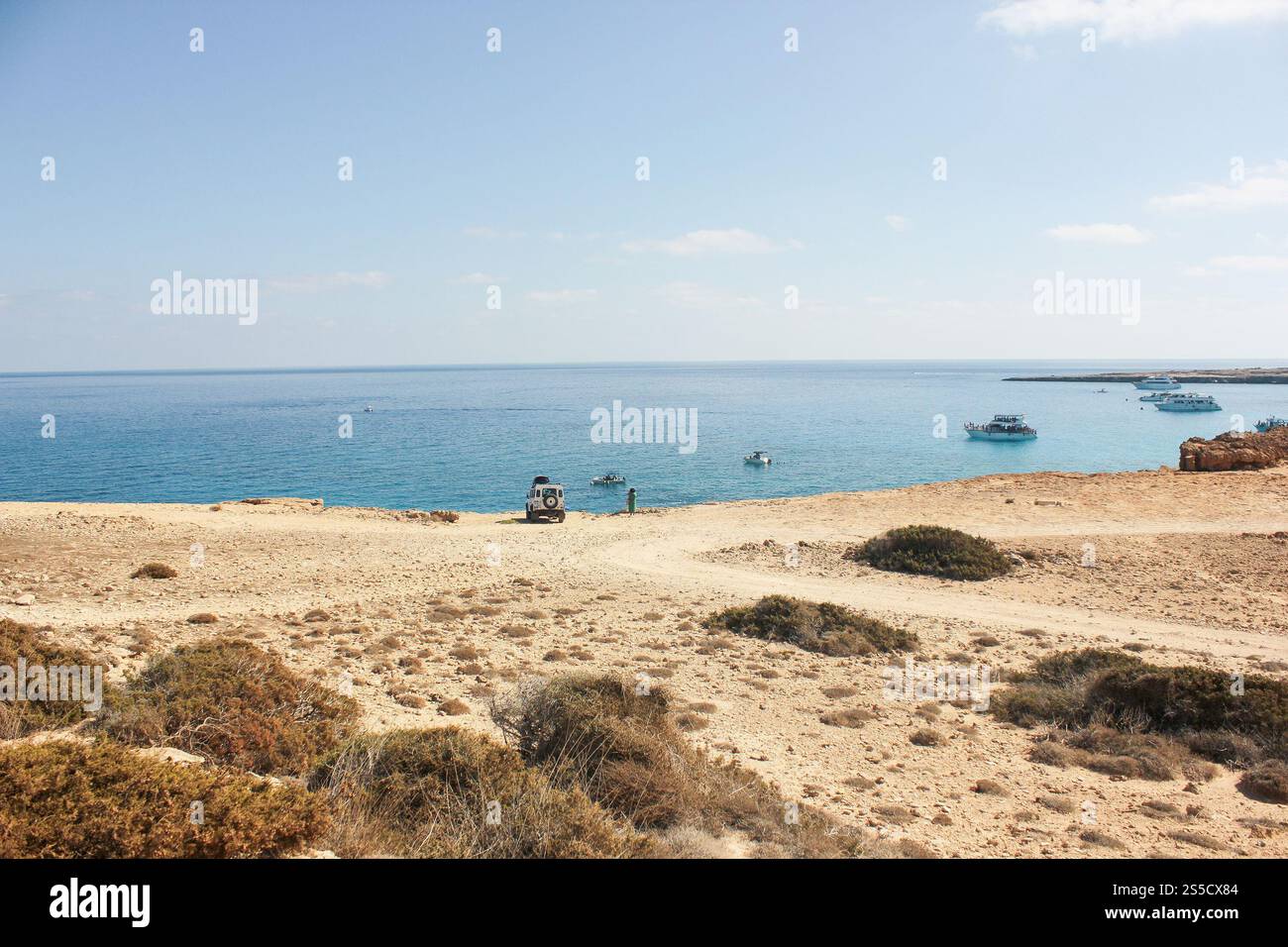 Long distance view of Cape Cavo Greco in summer Stock Photo - Alamy