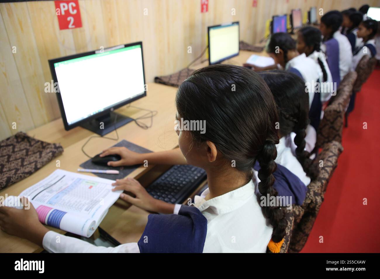 Girl students working on computer Stock Photo - Alamy
