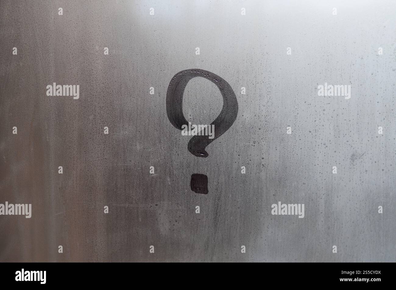 The inscription on glass, question mark concept. Question sign is ...