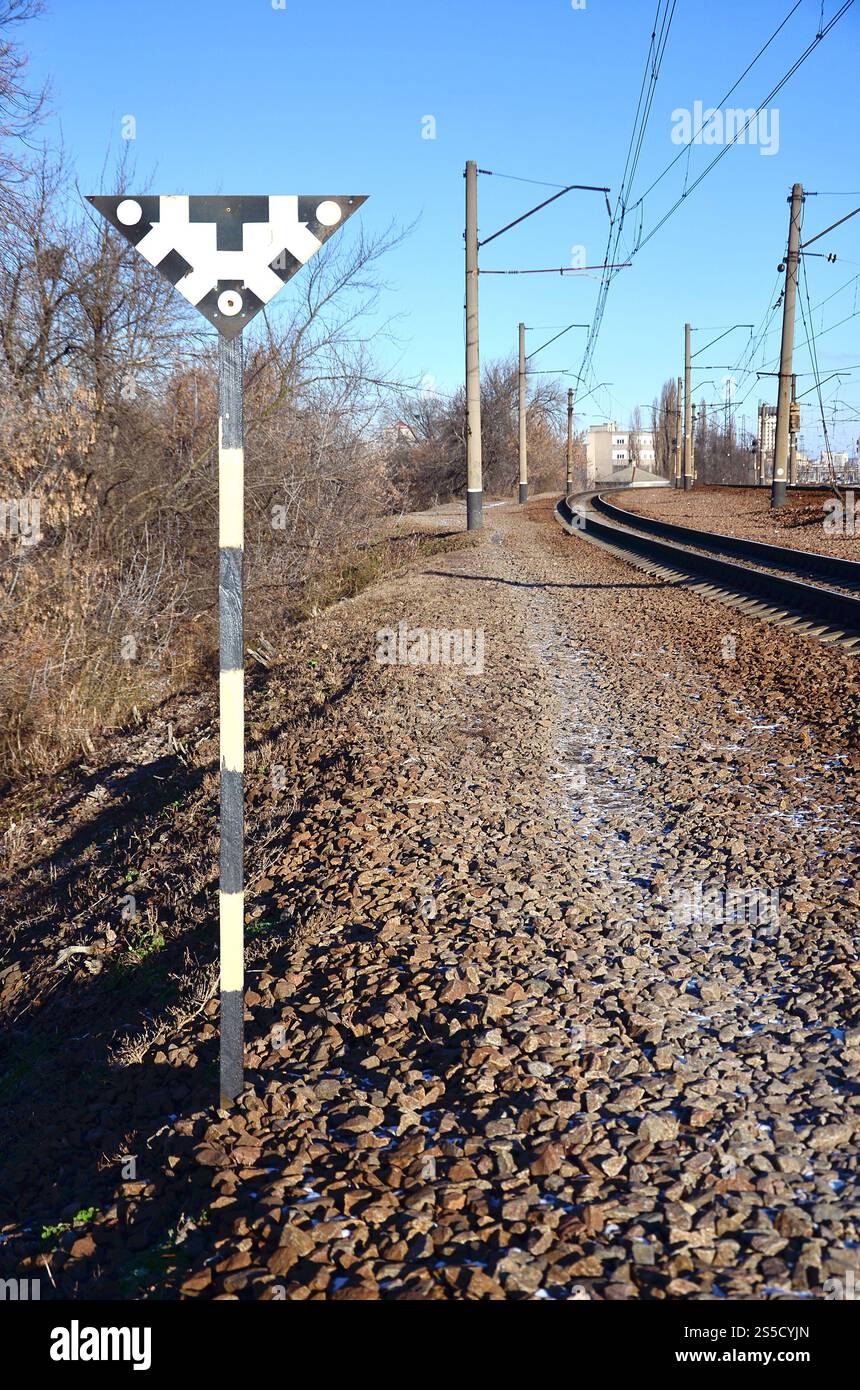 Railway landscape. Railroad sign with the sunny railway background and ...