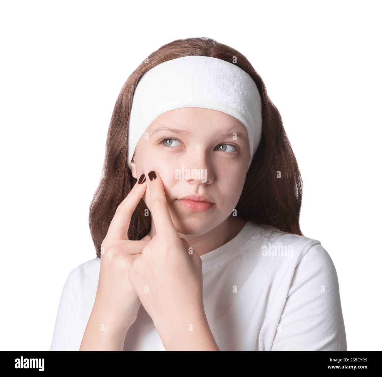Teenage girl popping pimple on her face against white background. Acne ...
