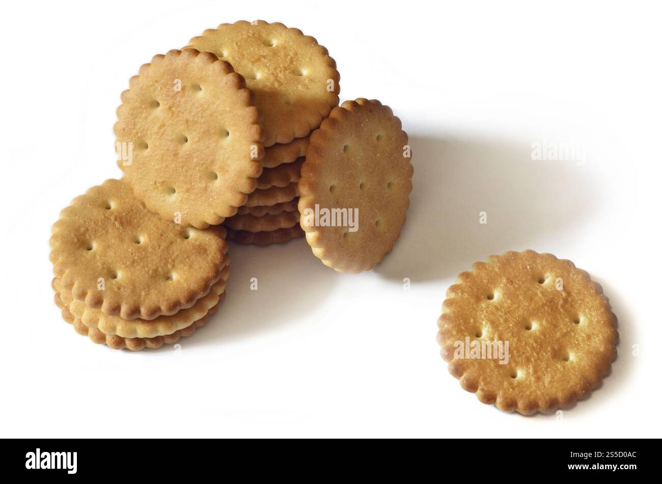 Classic round golden yellow salted cracker isolated on over white ...