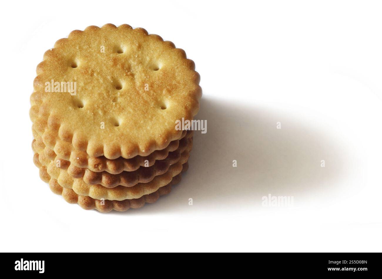 Classic round golden yellow salted cracker isolated on over white ...