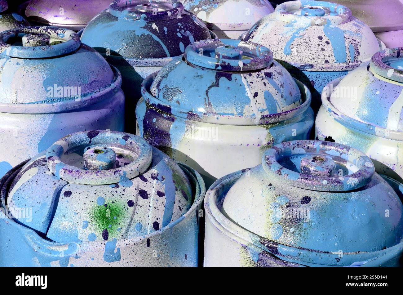 A lot of used blue metal tanks with paint for drawing graffiti Stock ...