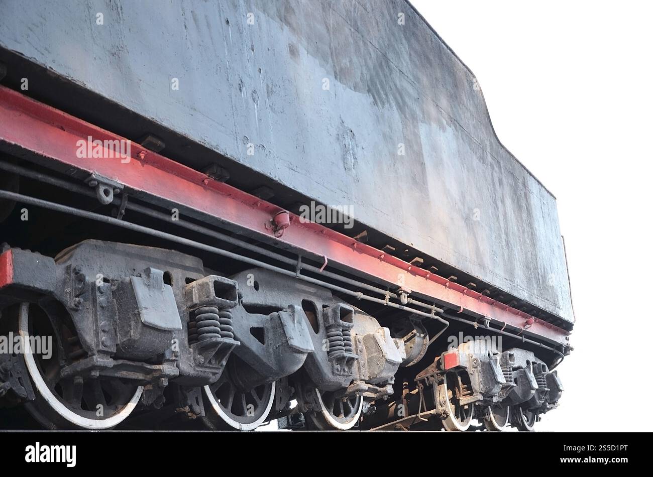 Black wheels of an old USSR locomotive. Vintage wheels of an old soviet freight railcar. Black ...
