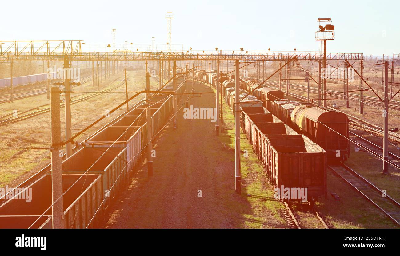 Railway landscape with many old railroad freight cars on the rails ...