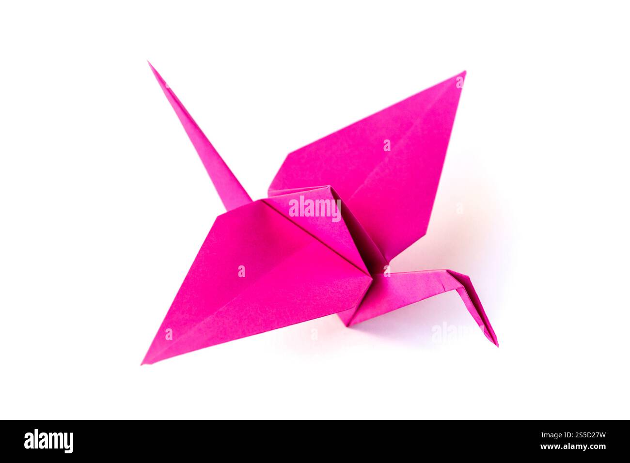 Pink paper crane origami isolated on a blank white background. Pink ...