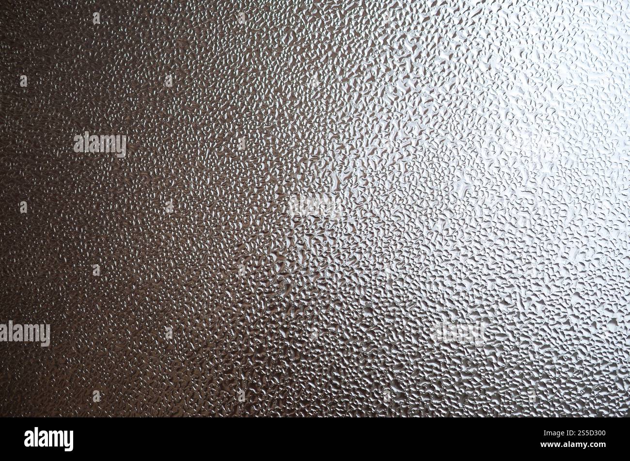 A photo of the glass surface of the window, covered with a multitude of ...