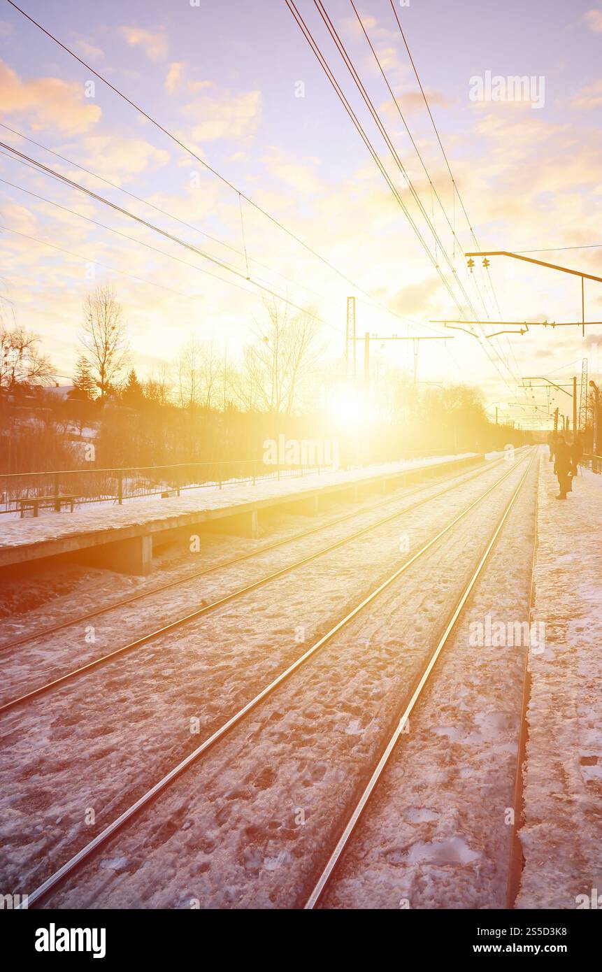 Photo of bright and beautiful sunset on a cloudy sky in cold winter ...