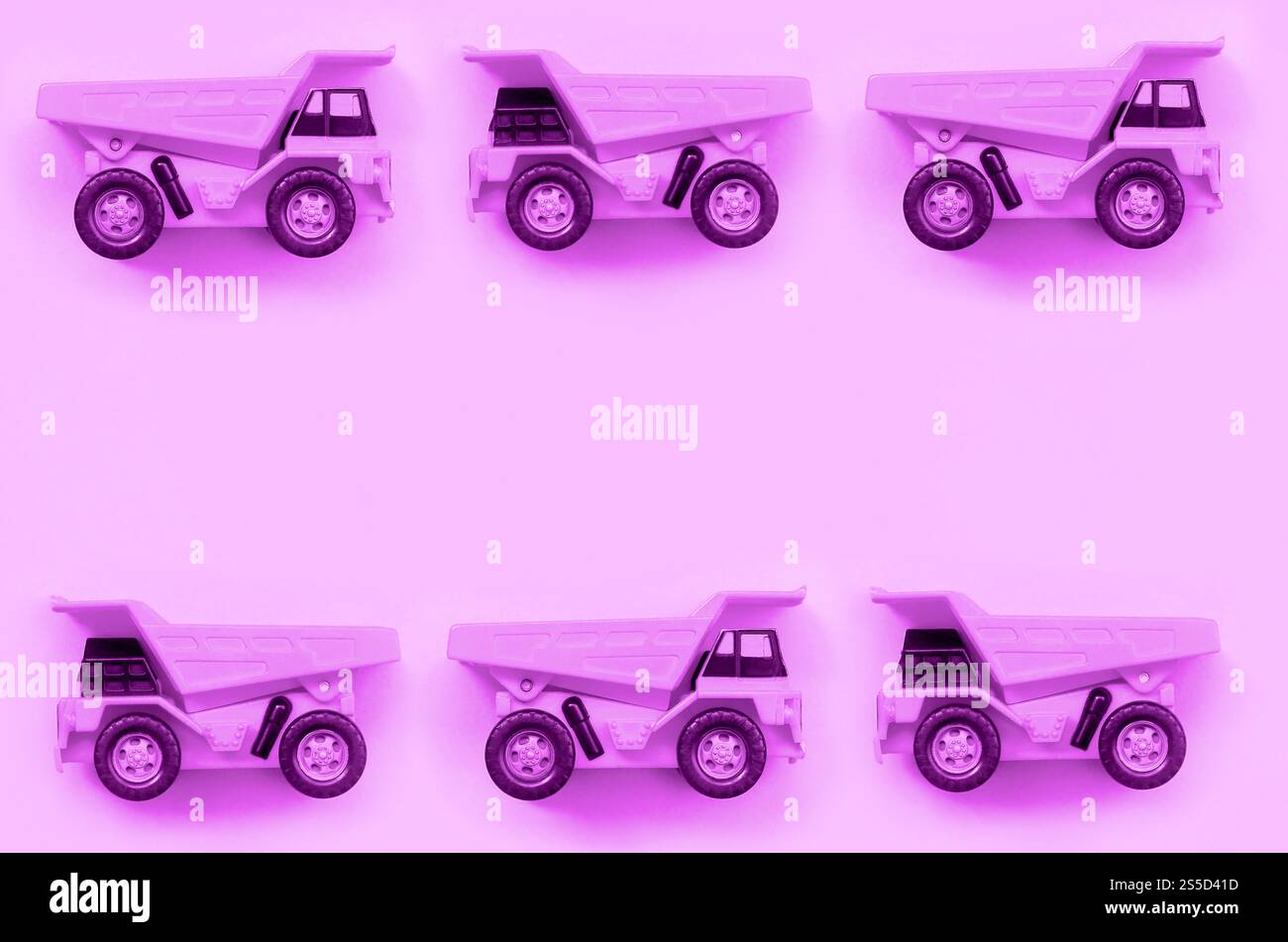 Many small purple toy trucks on texture background of fashion pastel ...