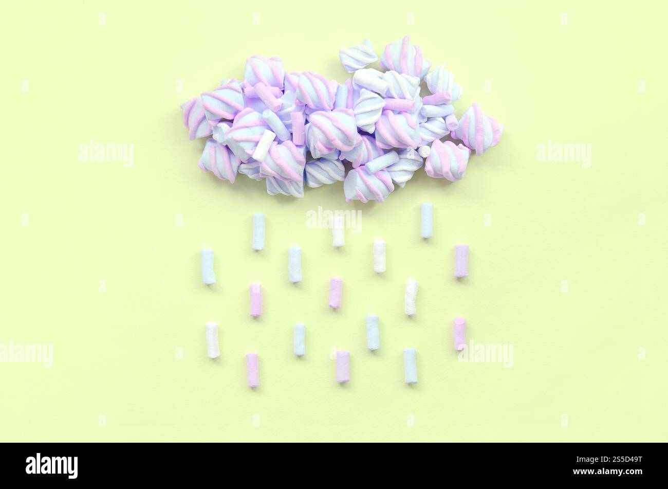 Marshmallow rain cloud on pastel light lime background. Cute ...