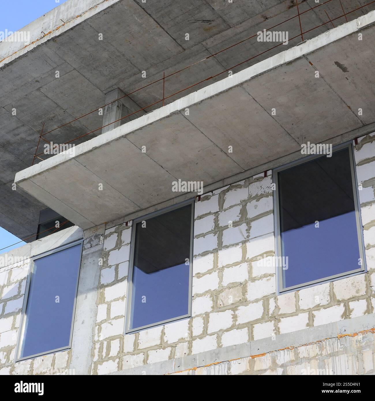 Fragment of an unfinished structure of a multi-storey building made of ...