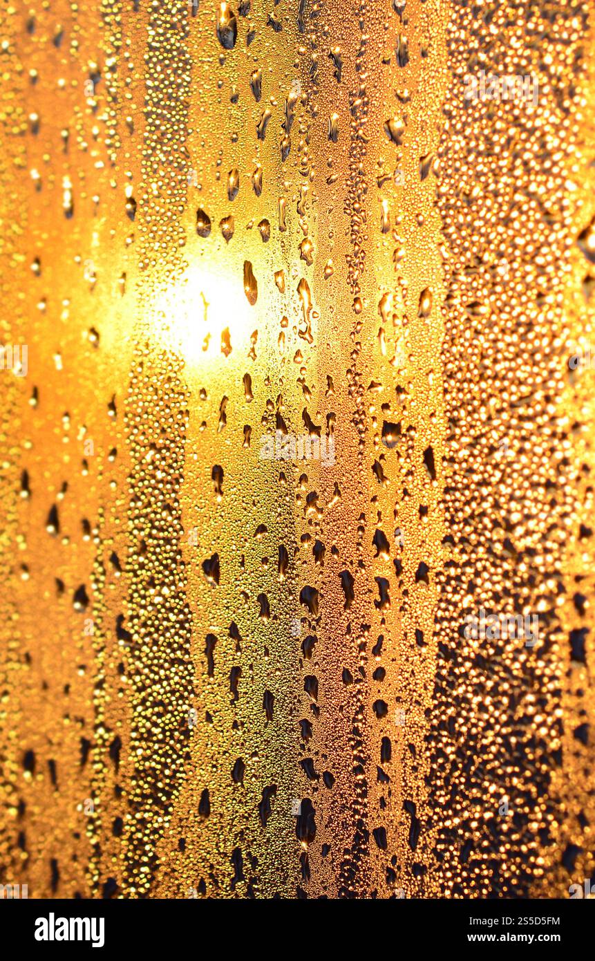 The texture of misted glass with a lot of drops and drips of ...