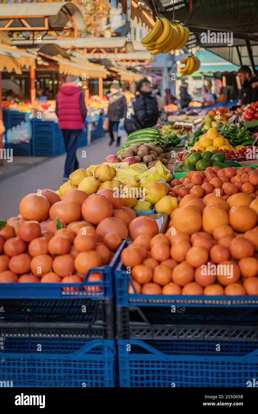 Colorful market stall filled with fresh fruits and vegetables, sunny ...