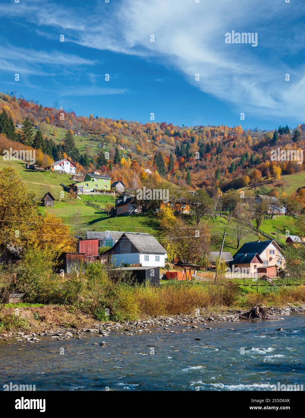 Autumn Carpathian mountain White Tysa river landscape with multicolored ...