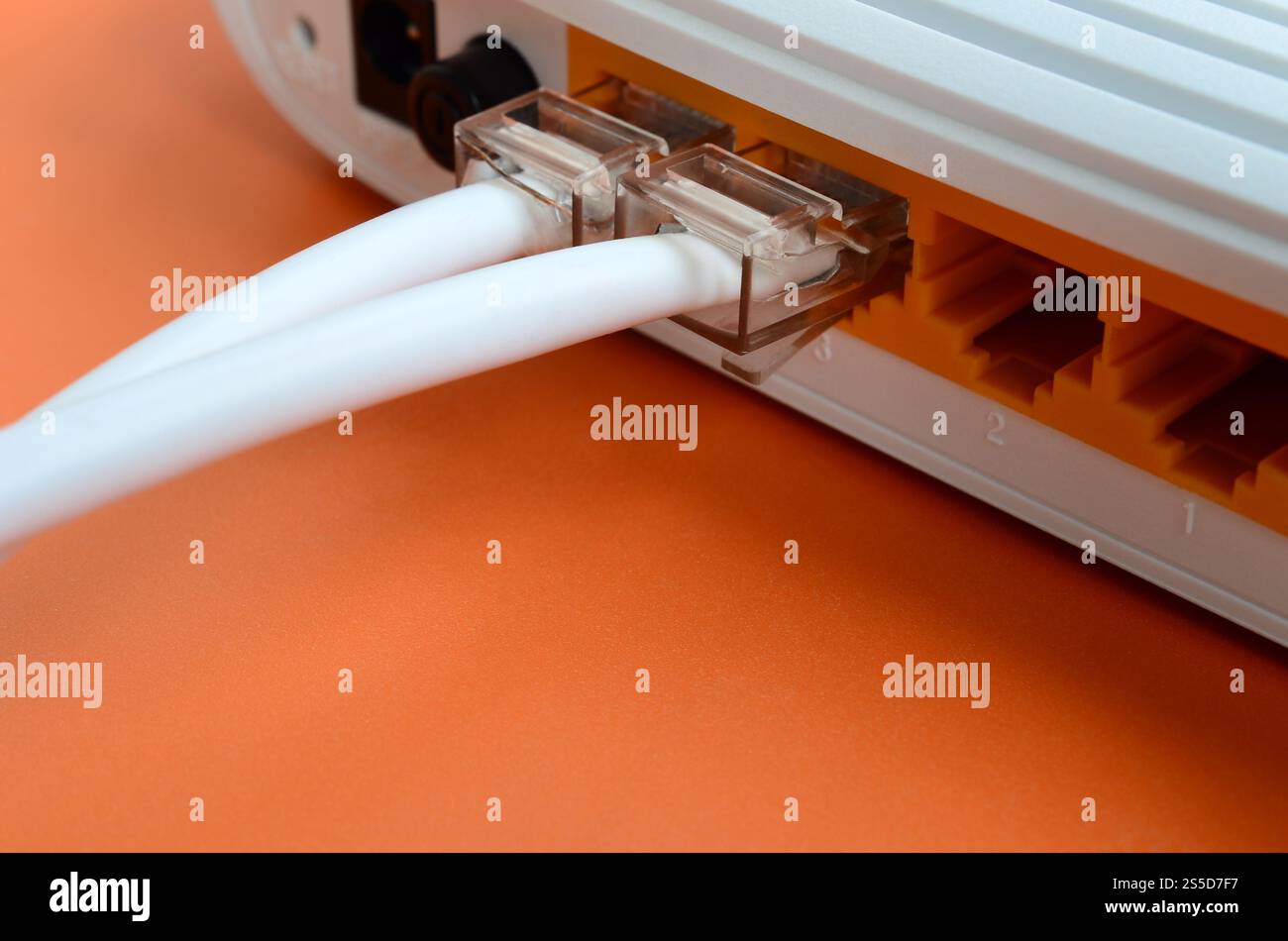 The Internet cable plugs are connected to the Internet router, which ...