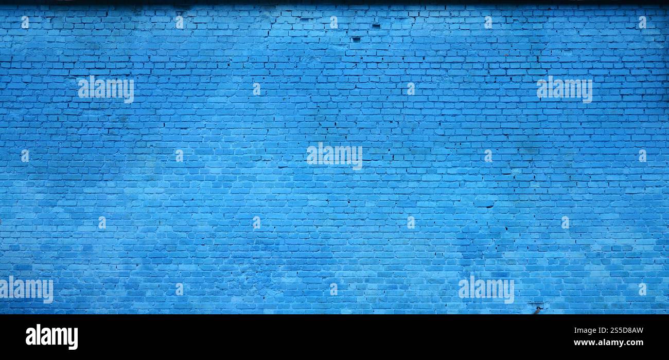 The texture of the brick wall of many rows of bricks painted in blue ...