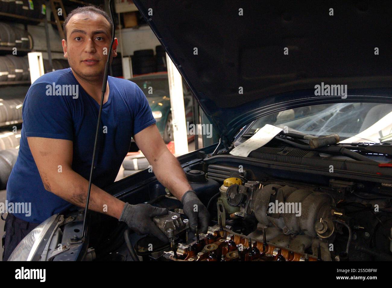 Turkish Car Mechanic Hard at Work. An Immigrant, Turksih Car Mechanic ...
