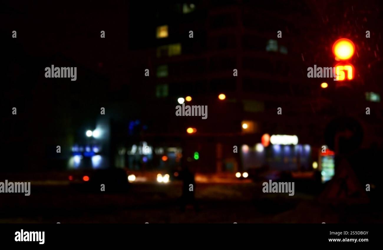 Blurred Defocused Lights of Traffic on a Wet Rainy City Road at Night ...