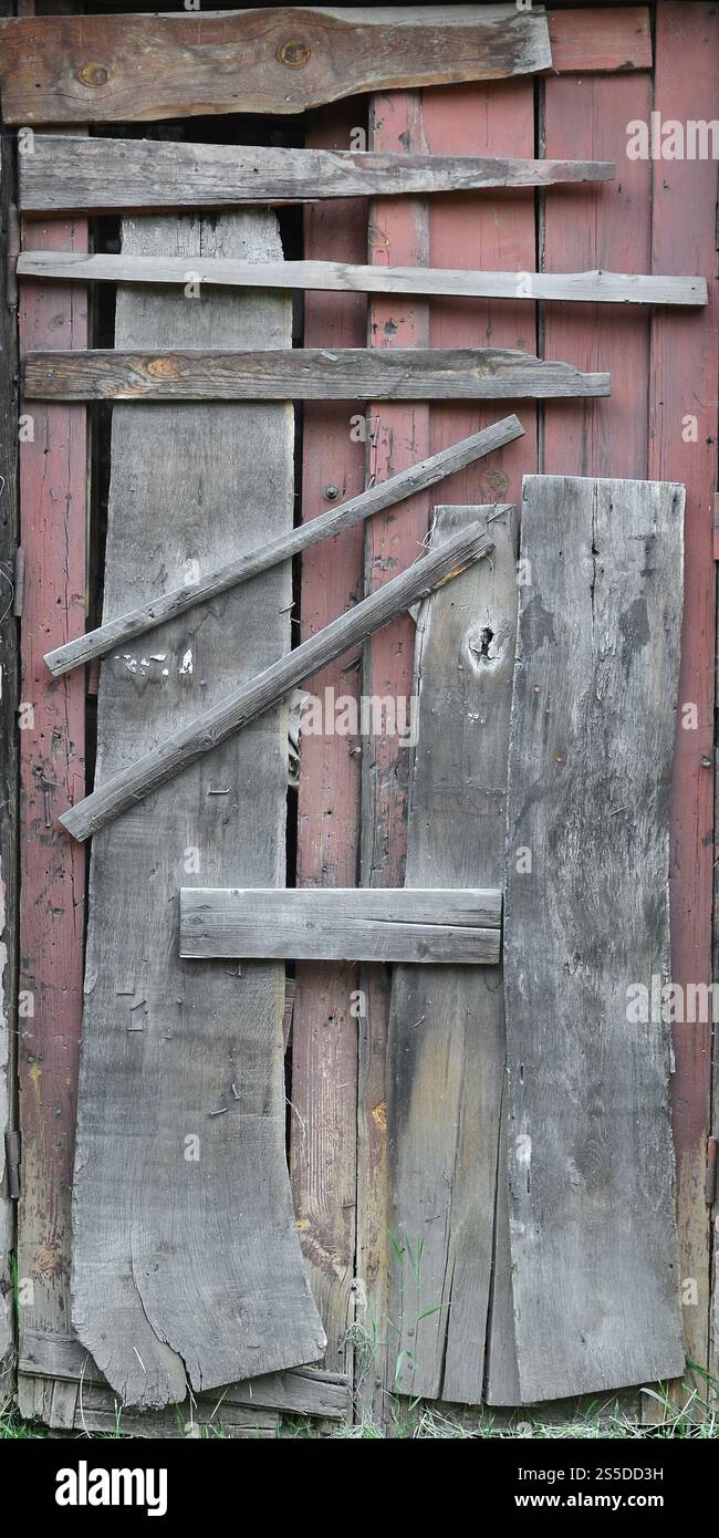 Boarded up wooden door to an old abandoned house Stock Photo - Alamy