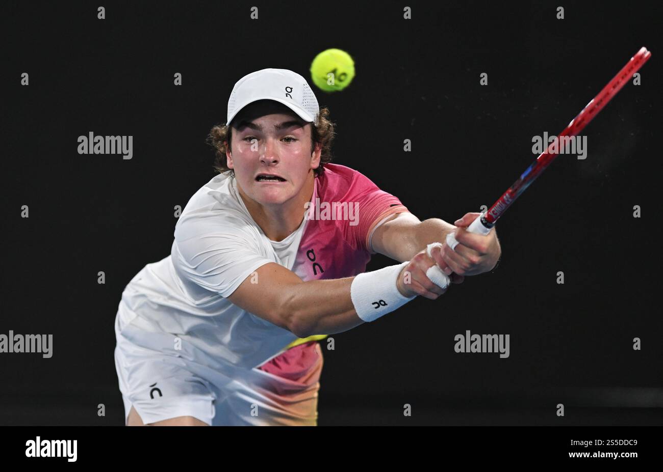 Melbourne, Australia. 14th Jan, 2025. Joao Fonseca of Brazil returns during his round 1 match ...