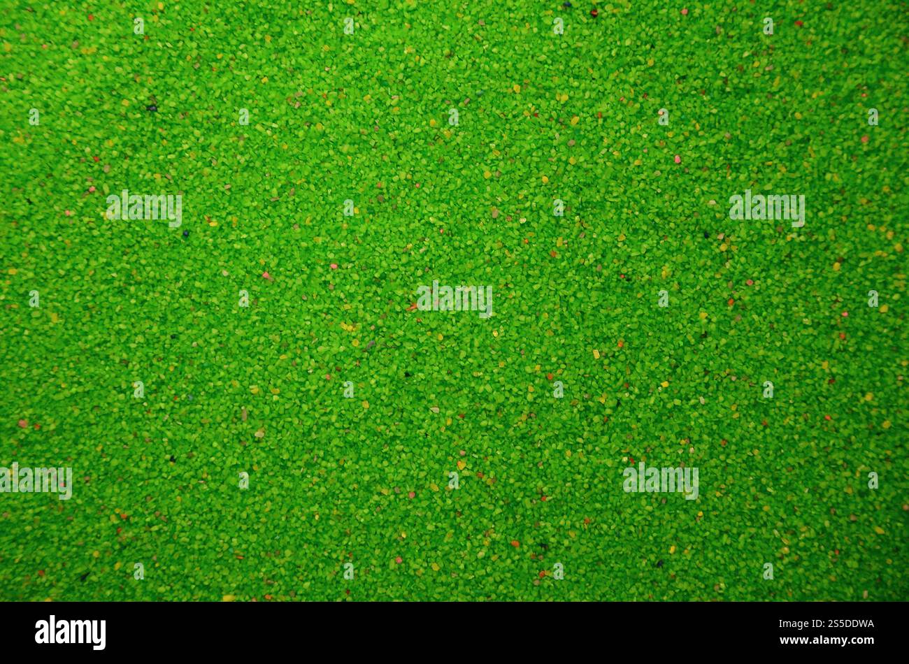 Texture of a colored granular sand close up. Green grains Stock Photo ...