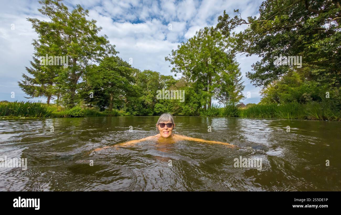 Female swimming in open hi-res stock photography and images - Alamy