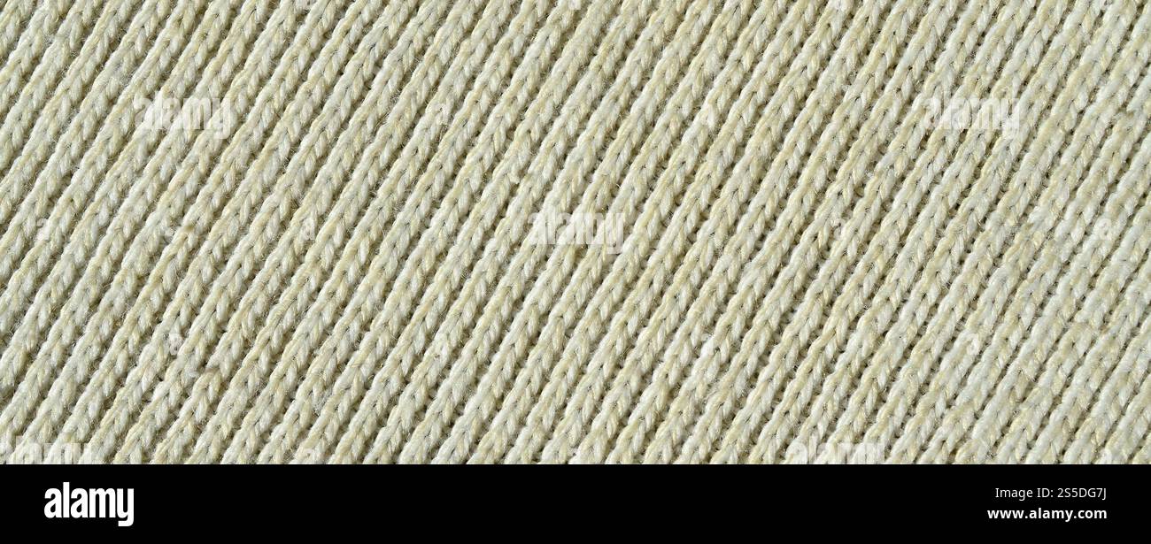 Fabric texture of a soft yellow knitted sweater. Macro image of the ...