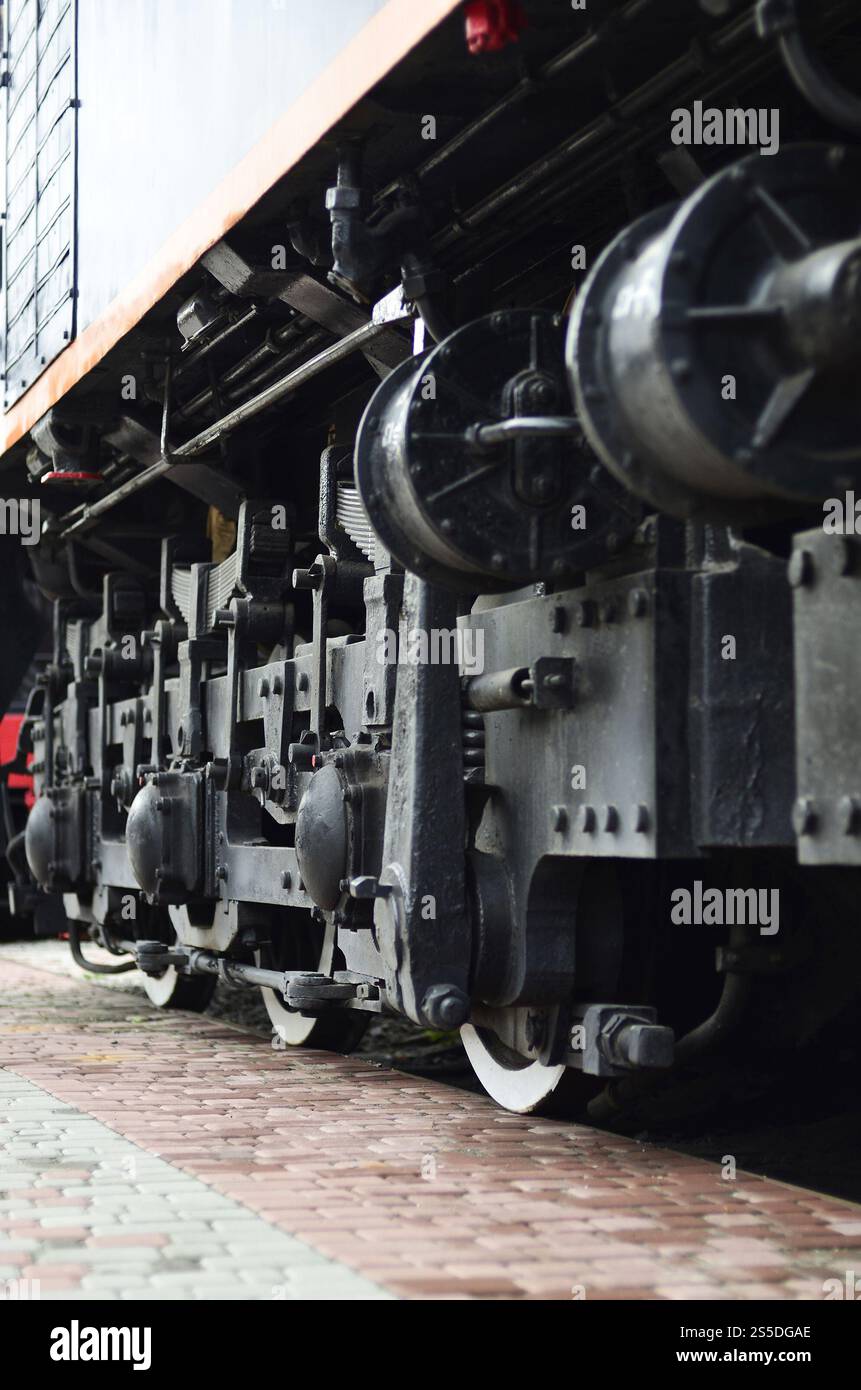Wheels of a Russian modern locomotive, view from side. Transportation ...