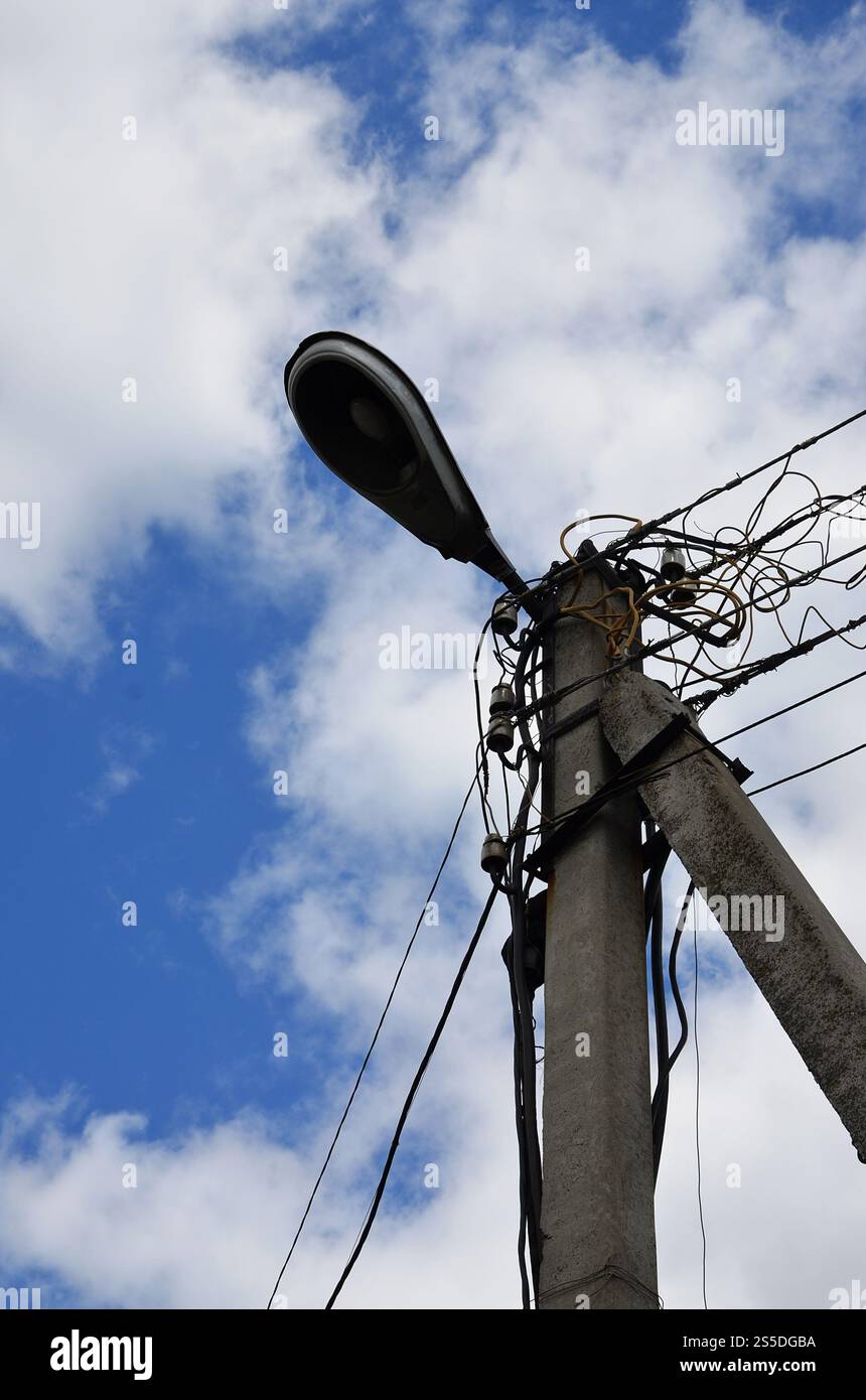 Old concrete electric pole for transmission of wired electricity with ...