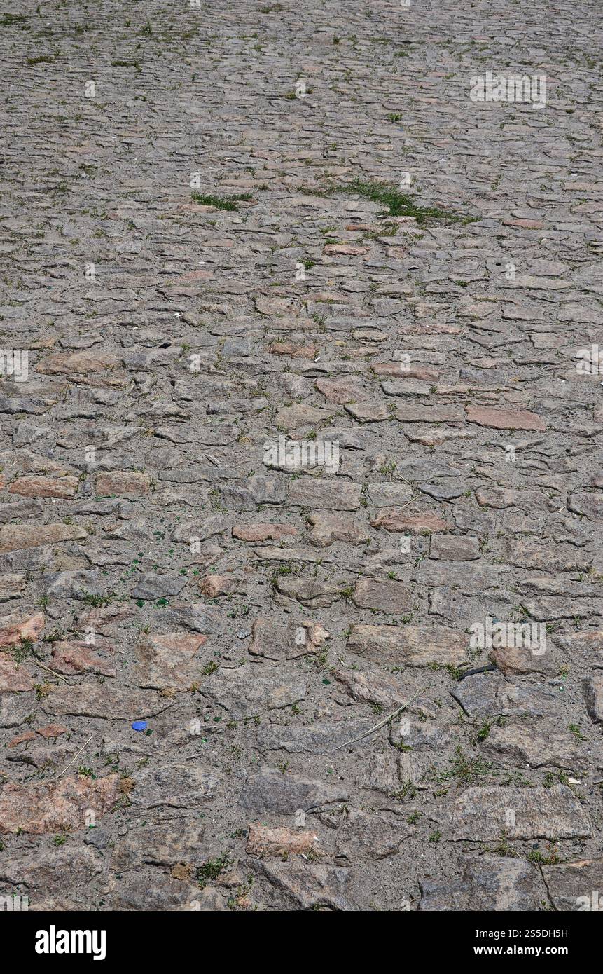 The texture is very old and inaccurately laid out pavers made of relief ...