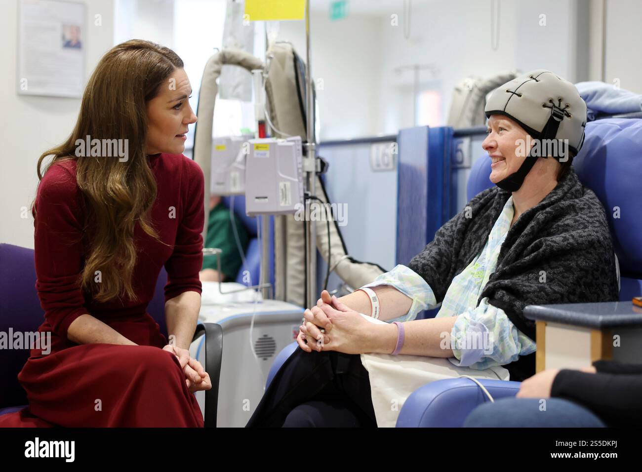 Britain's Princess Kate, left, talks with Katherine Field during a ...